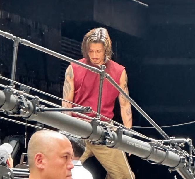 Ting Fung transforms into a curly-haired homeless man and his height is ...