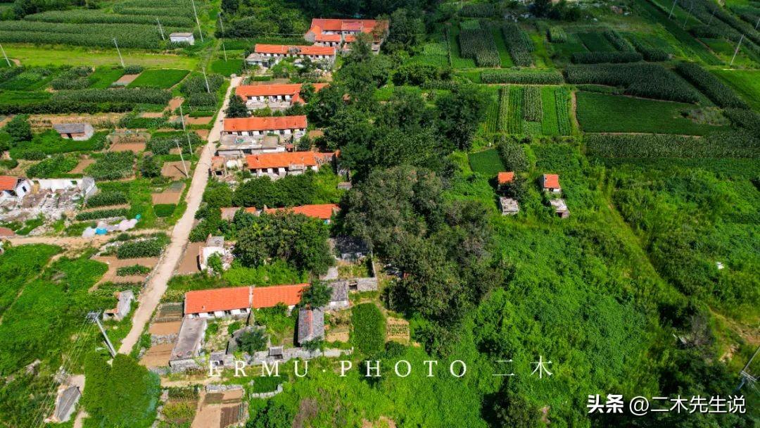 Aerial shot of Gong's family on White Beach in Rushan, where Gong Gui ...
