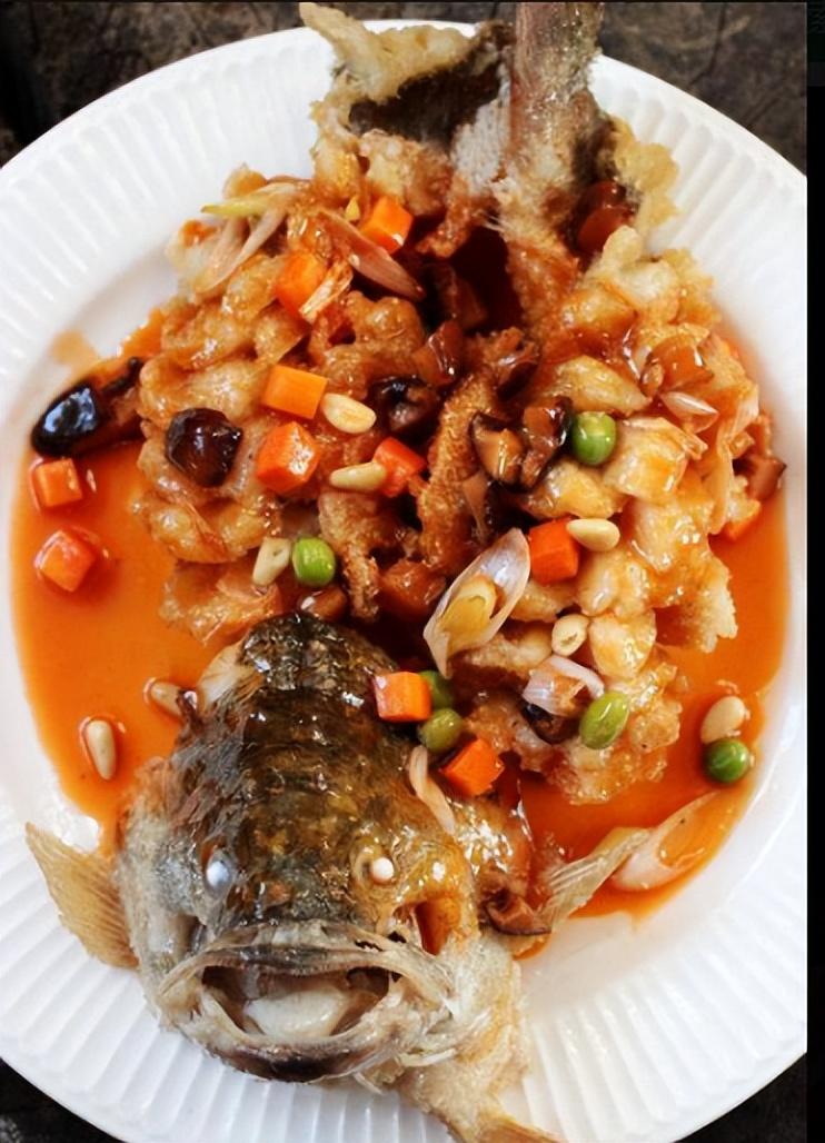 Grass carp makes a difficult dish called squirrel fish - iMedia