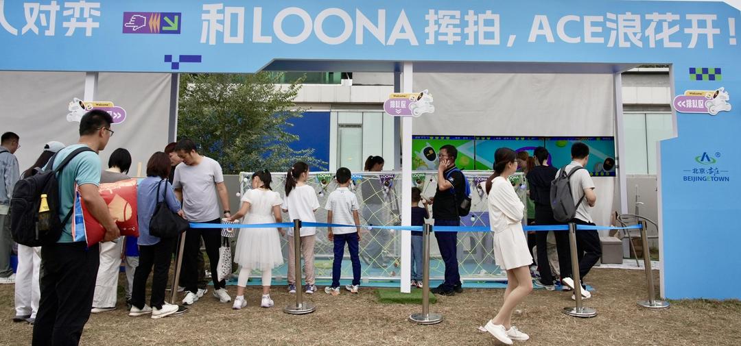 Cute robots! Loona's pet tennis booth was incredibly popular.‌ - iMedia