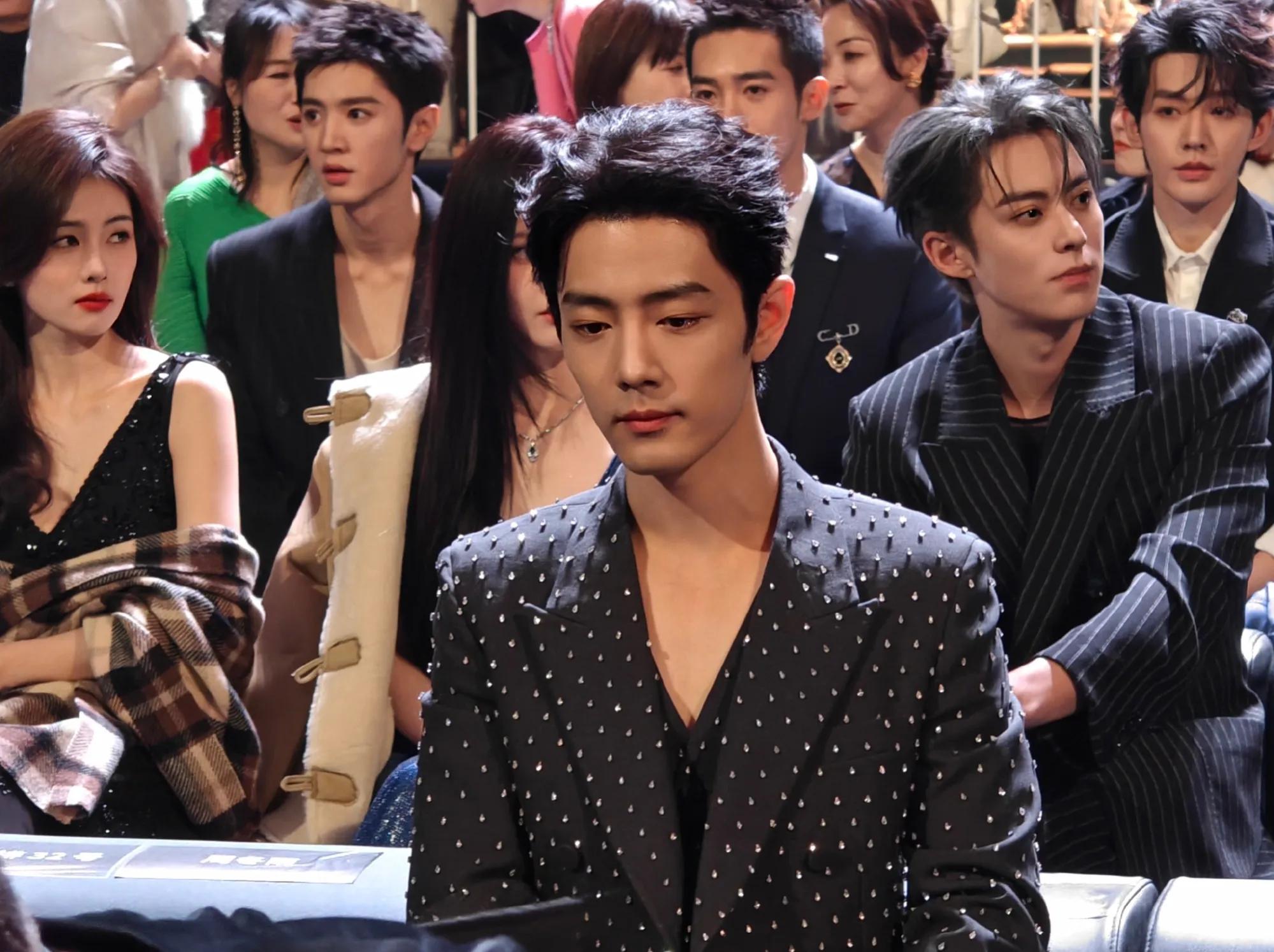 What does a male celebrity look like that makes men look "fascinated ...