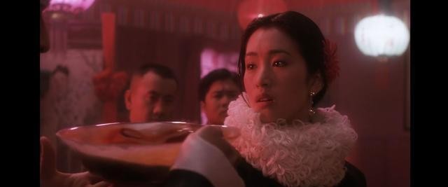 Gong Li has a broad figure with big shoulders, waist, large breasts and ...