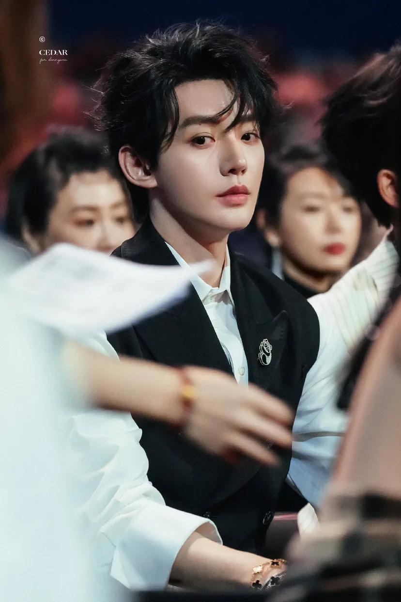 What does a male celebrity look like that makes men look "fascinated ...