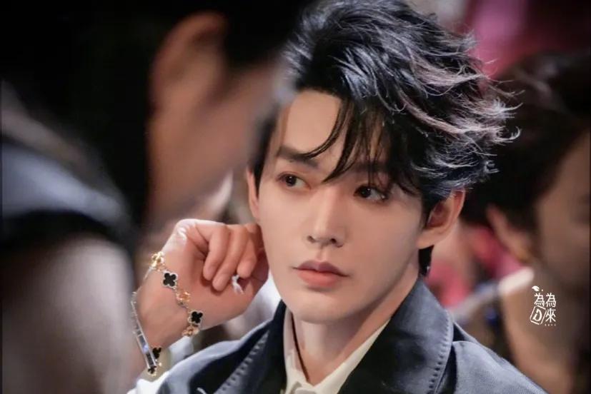 What does a male celebrity look like that makes men look "fascinated ...