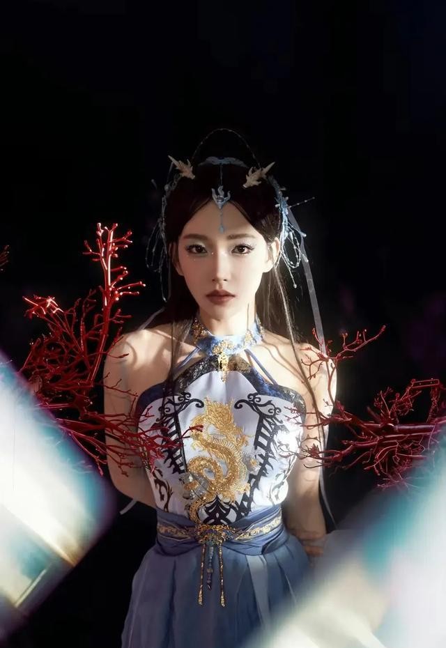 Cheng Xiao wore a blue dress to perform the national style dance "Liu ...