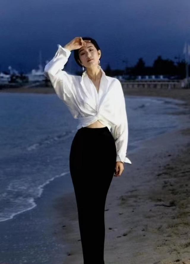 Gong Li has a broad figure with big shoulders, waist, large breasts and ...